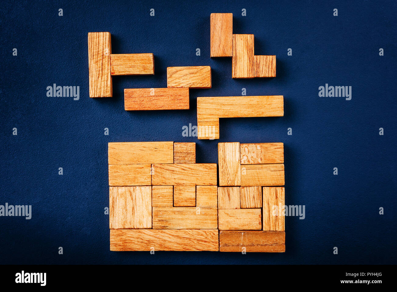 Different geometric shapes wooden blocks arrange in solid figure on ...