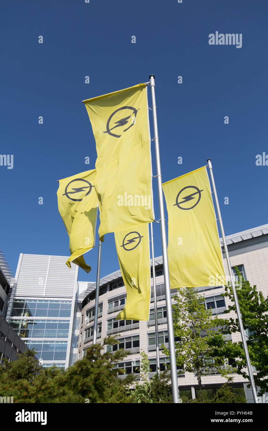 Germany, Ruesselsheim, Opel Automobile GmbH: Flags with Opel logo at ...