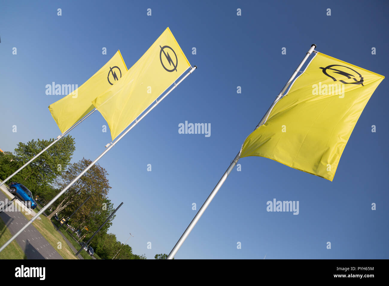 Germany, Ruesselsheim, Opel Automobile GmbH: Flags with Opel logo at ...