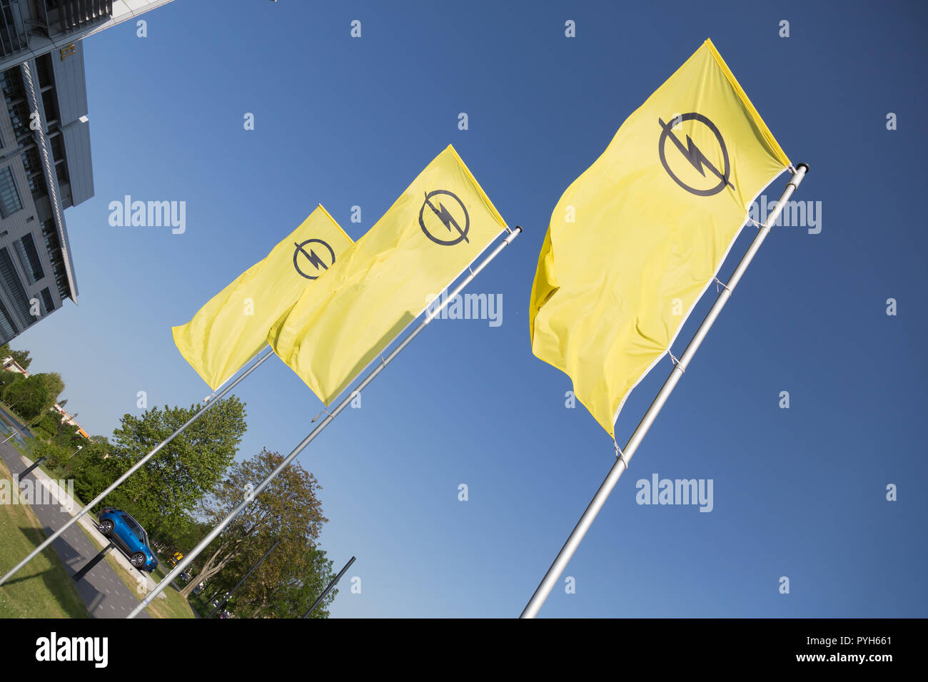Germany, Ruesselsheim, Opel Automobile GmbH: Flags with Opel logo at ...