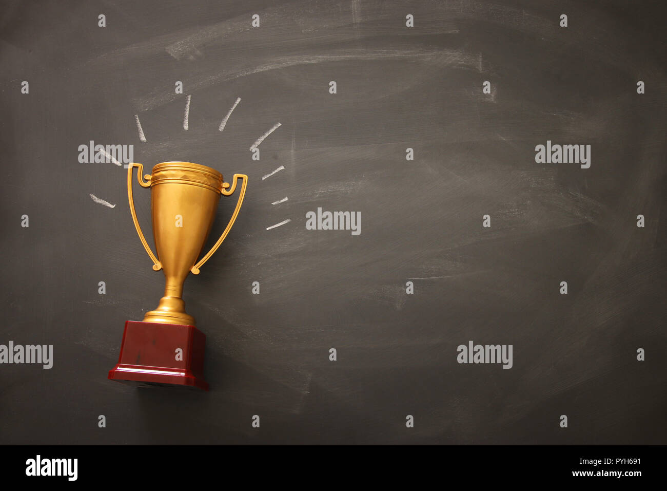 golden trophy over blackboard background. top view. flat lay Stock ...