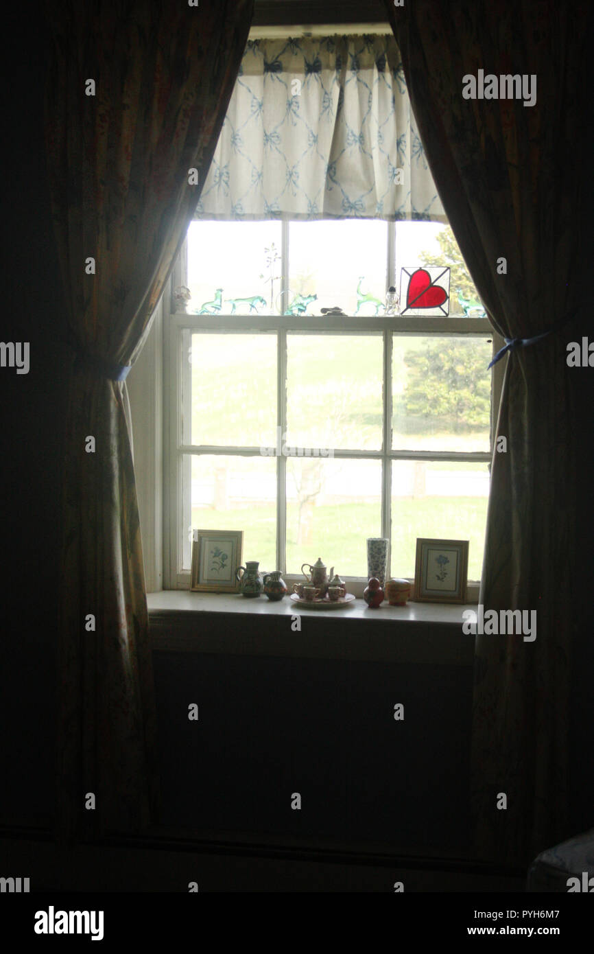 Light coming through window of house decorated in vintage style Stock ...
