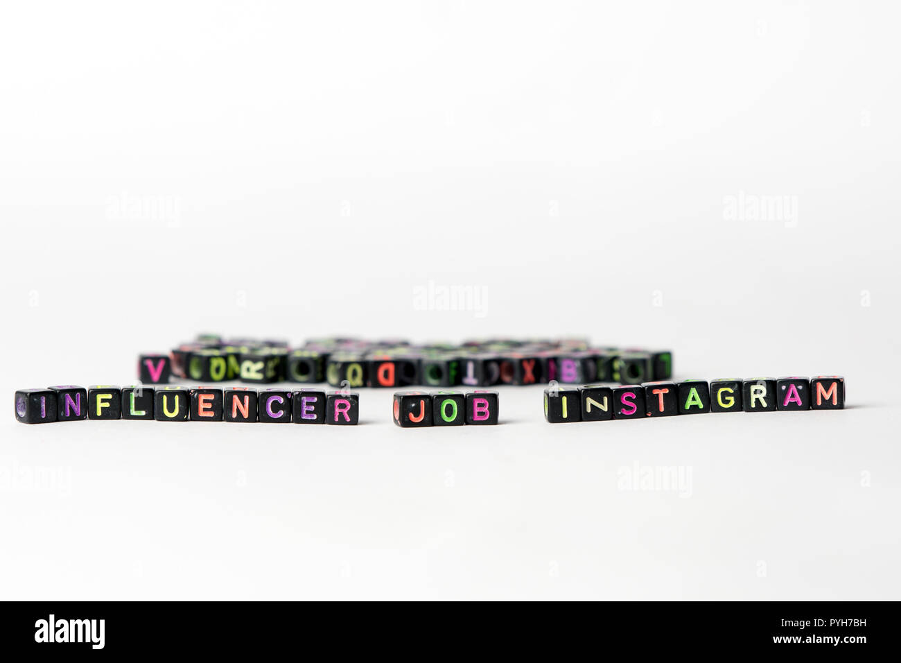 Text `Influencer, Job, Instagram` composed of small black blocks with ...