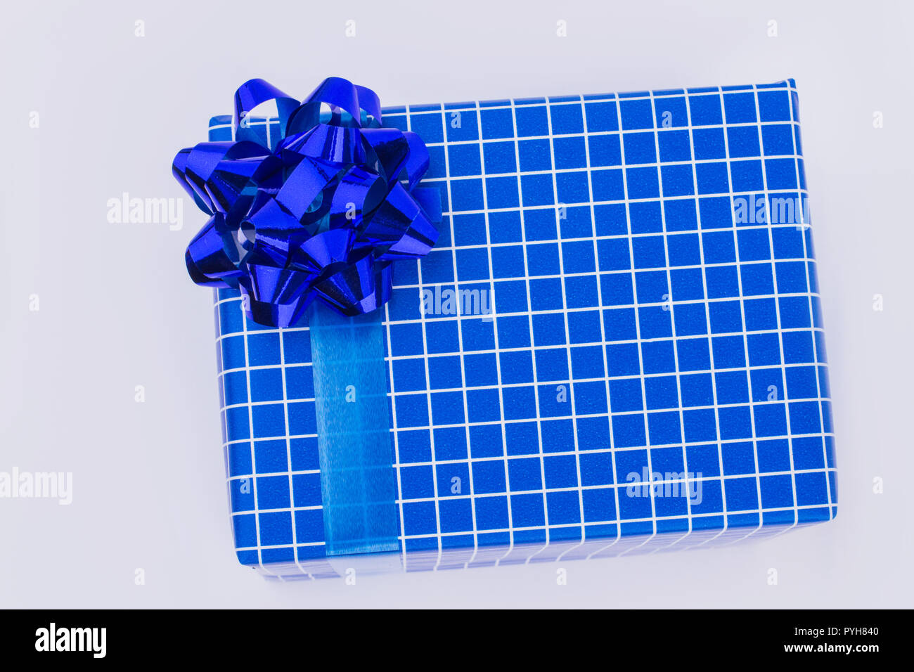 Beautifully wrapped blue patterned gift box. Gift box packed in blue ...