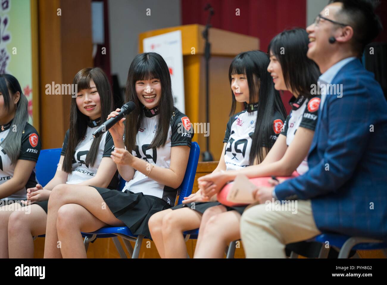 Female E-gamer Lily Yim seen speaking during the school visit. The Hong ...