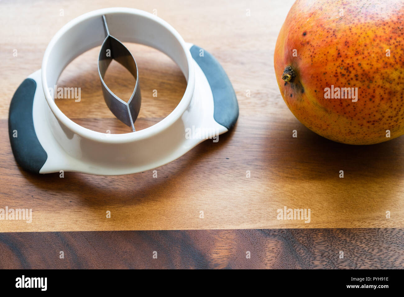 The Mango Splitter slices cleanly through the fruit and leaves almost ...
