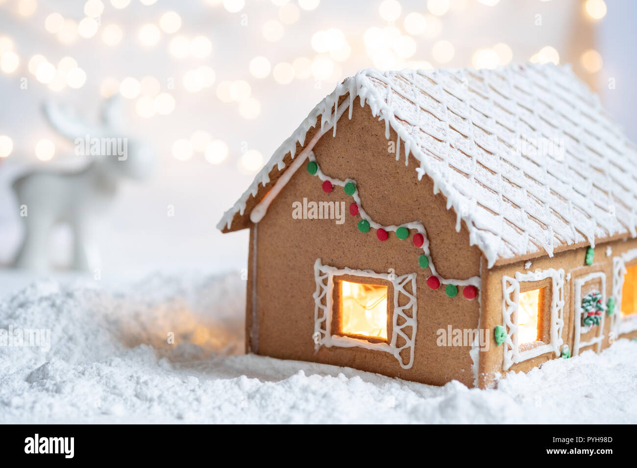 Gingerbread house in snow Stock Photo - Alamy