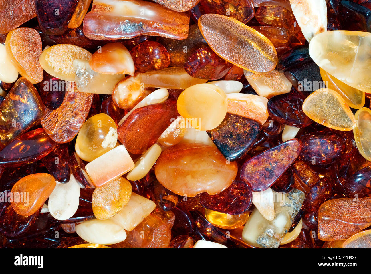 Background, natural yellow and brown amber Stock Photo - Alamy