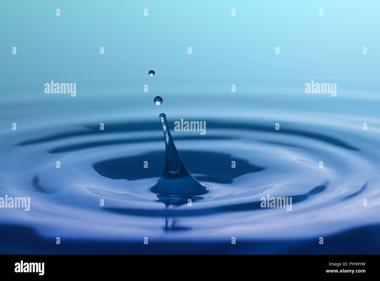 Water splash. Falling drop of rain Stock Photo - Alamy