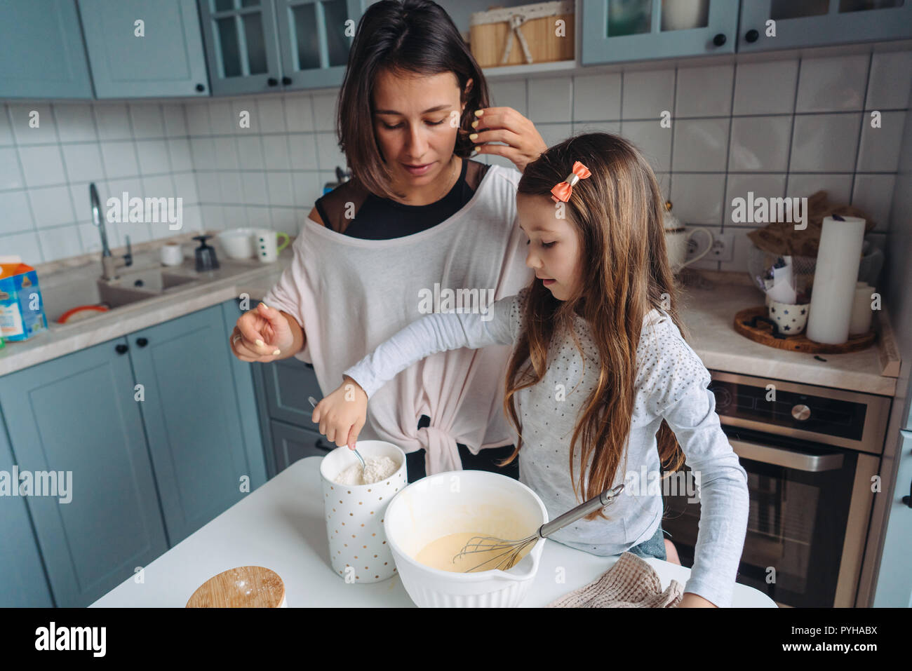 happy family cook together in the kitchen Stock Photo - Alamy