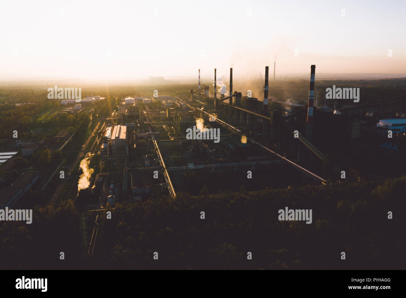 industrial landscape with heavy pollution produced by a large factory ...