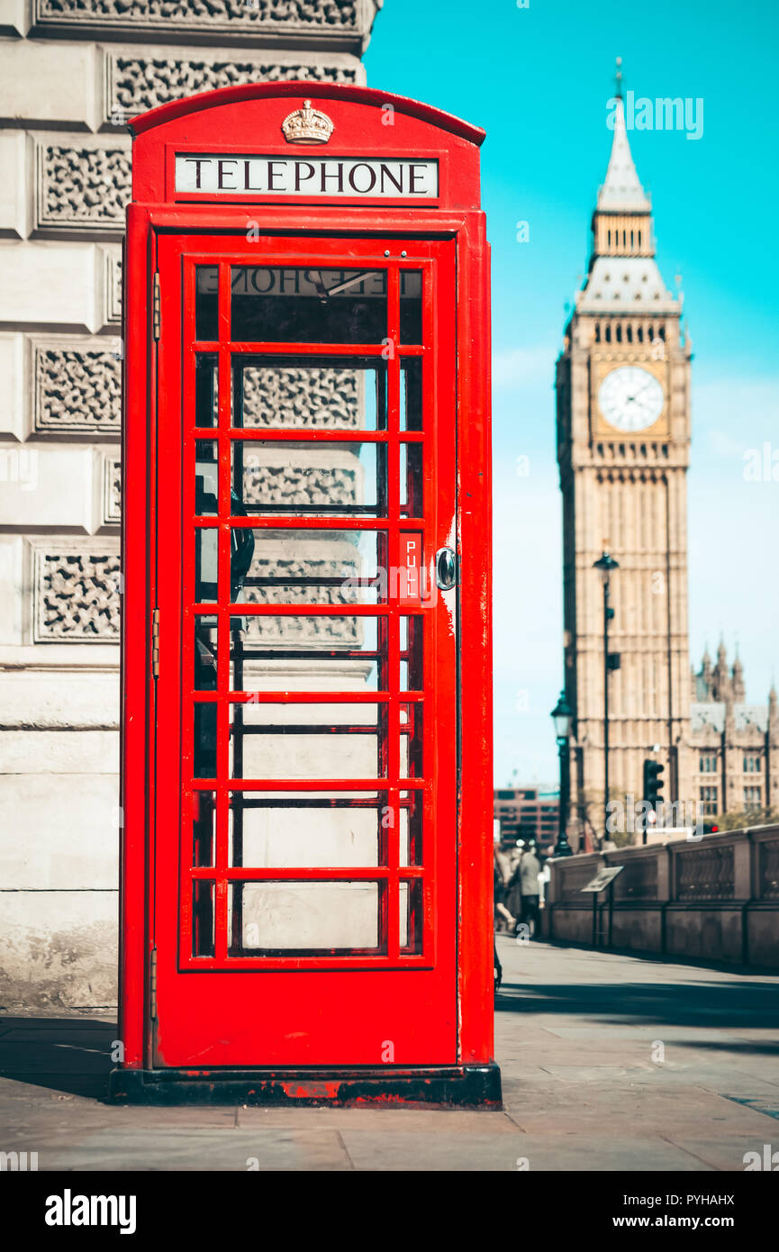 London's iconic telephone booth with the Big Ben clock tower in the ...