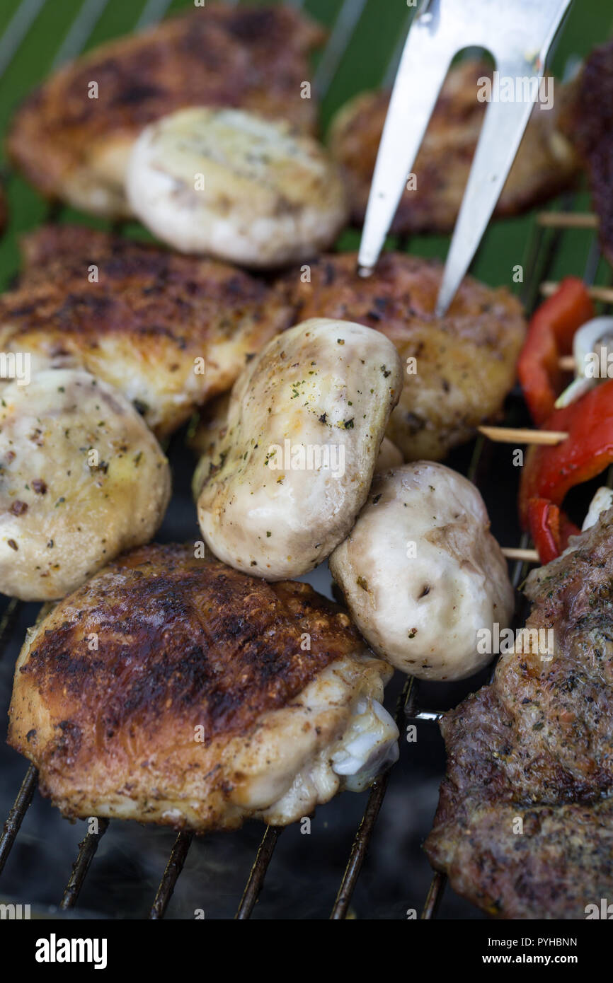 barbecue with delicious grilled meat on grill Stock Photo - Alamy