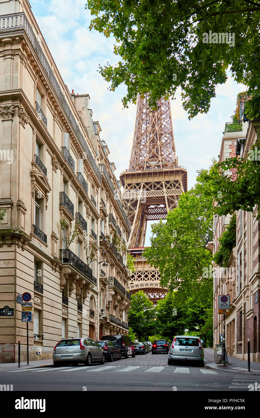 Parisian street with an Eiffel Tower view Stock Photo - Alamy