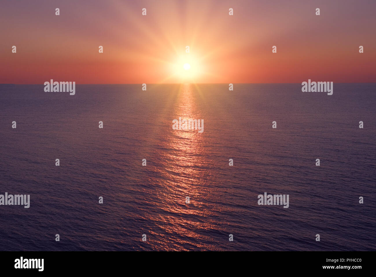 Sunrise over Azov Sea Kazantip-Beach with bright sun Stock Photo - Alamy