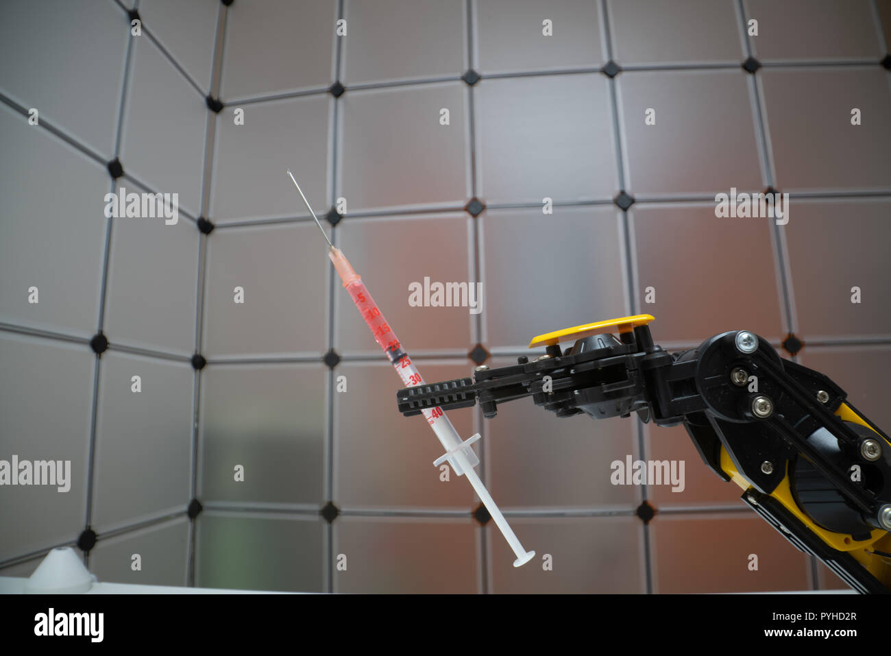 robot arm with medical syringe Stock Photo - Alamy