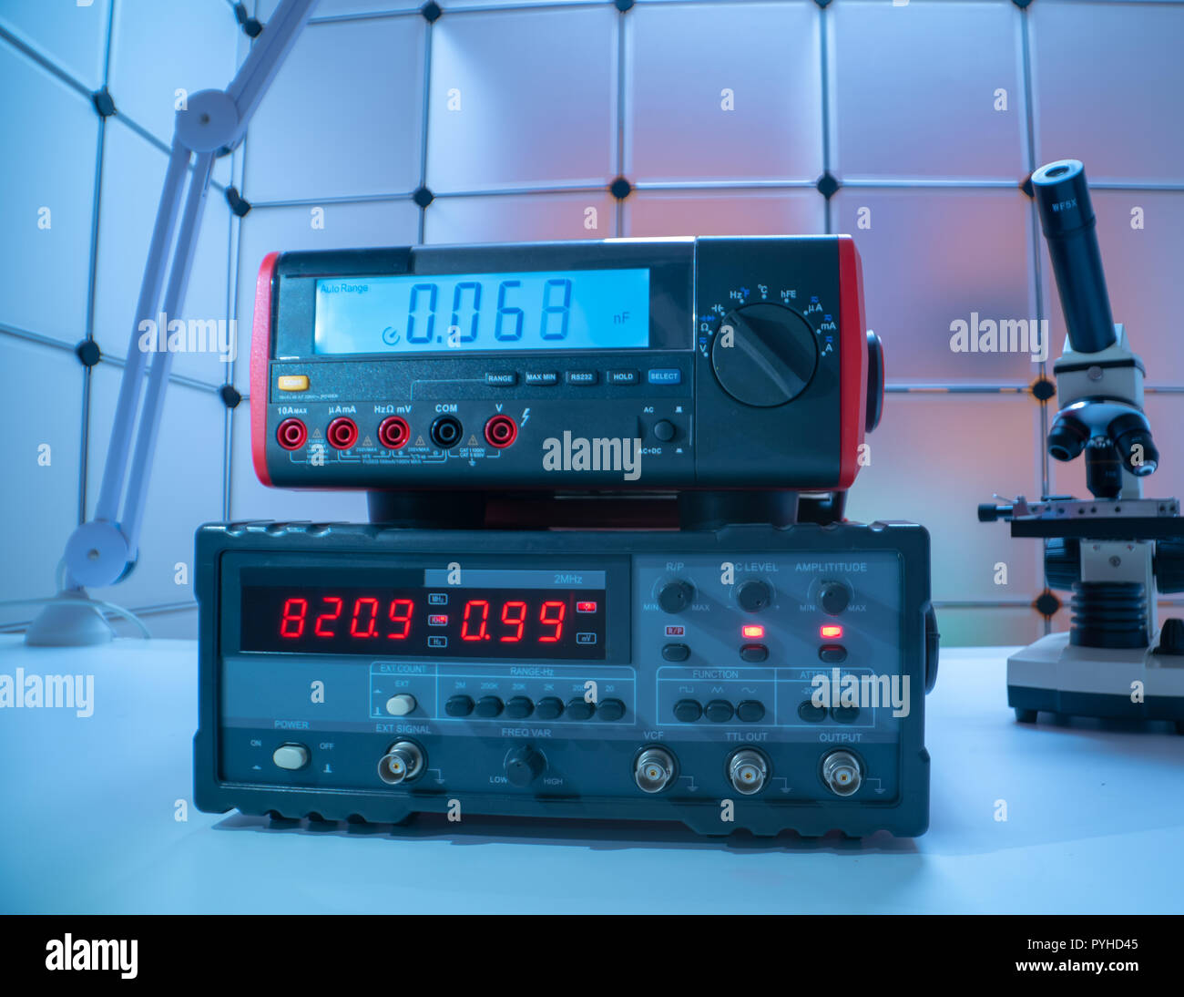 Electronic measuring instrument. Function generator and Multimeter ...