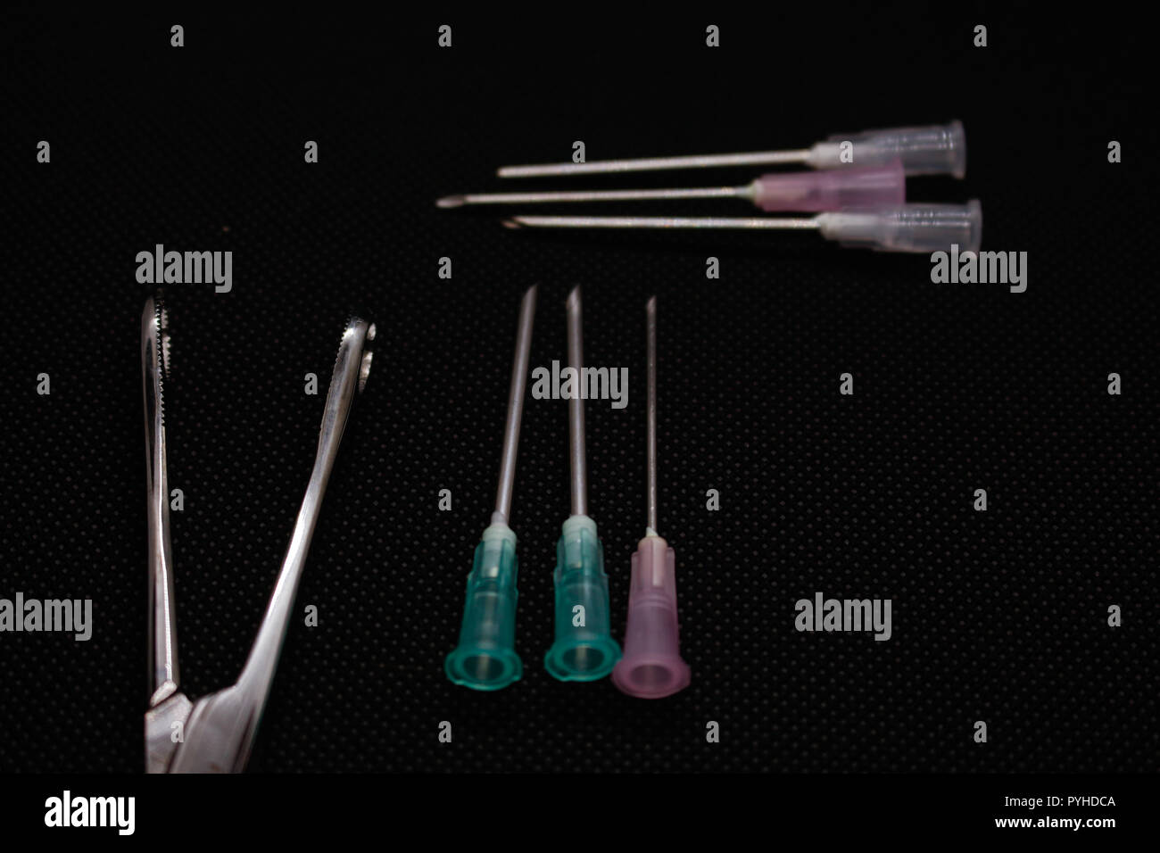 Cannula iIsolated on black background. Medical needle. Macro shot Stock ...