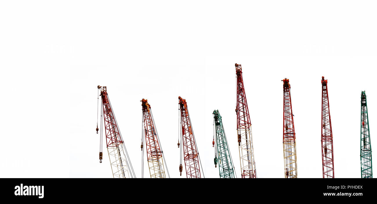 Set of big construction crane for heavy lifting isolated on white ...