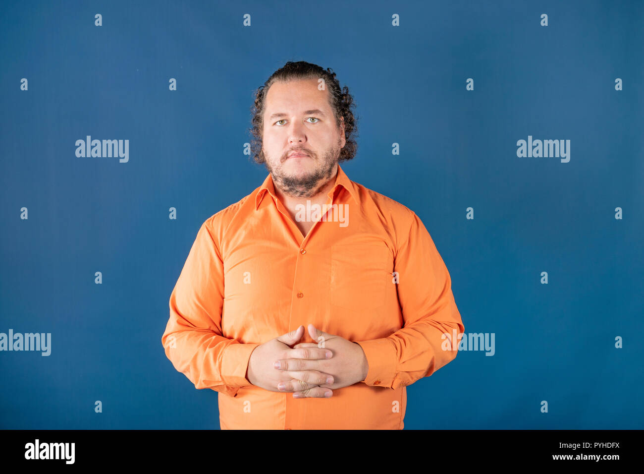 Sad fat man posing in the studio. Health problems. Excess weight Stock ...
