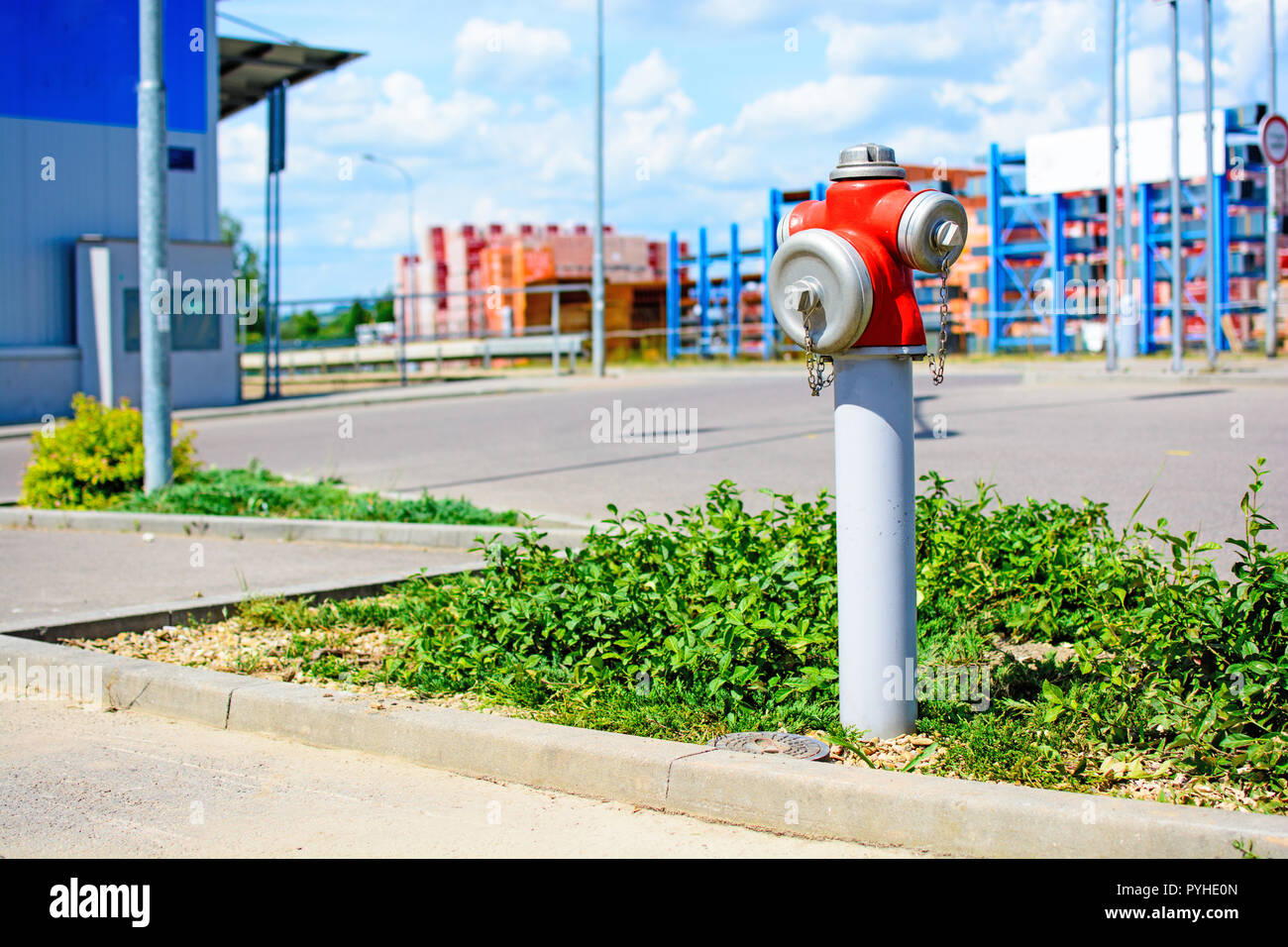 Red overground fire hydrant in the city center. Source of fire water ...