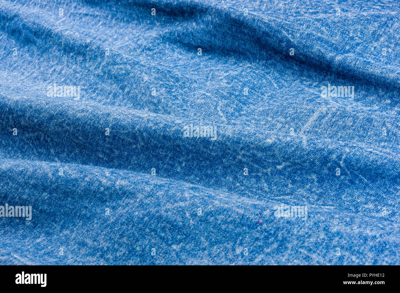 Blue washed faded jeans texture with seams, clothing items, macro ...