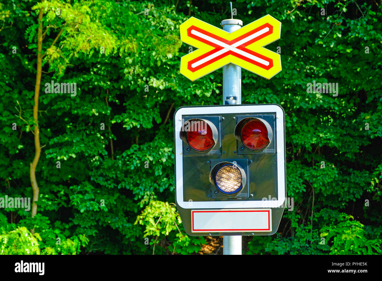 Semaphores in front of the railway crossing. Warning signaling on ...