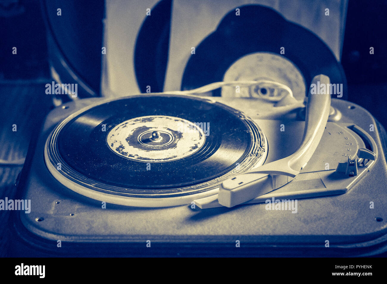 Antique gramophone with a stack of vinyl records Stock Photo - Alamy