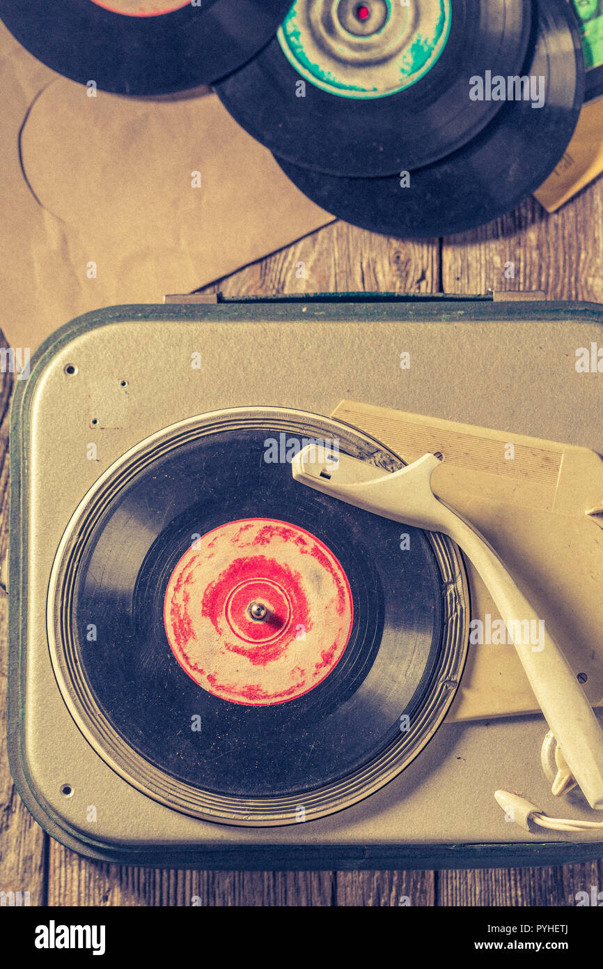 Antique record player with a stack of vinyl records Stock Photo - Alamy