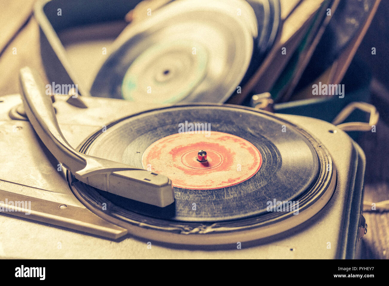 Closeup of old gramophone with a stack of vinyl records Stock Photo - Alamy