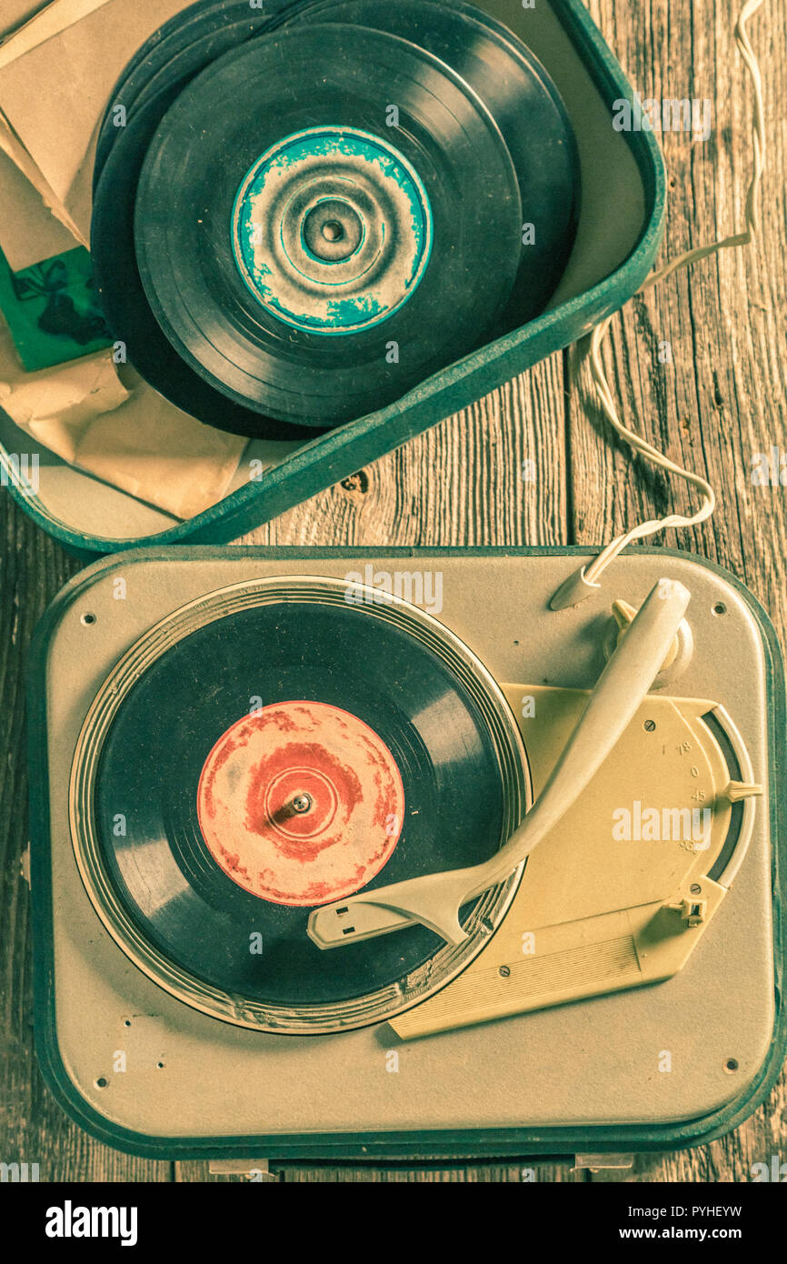 Antique record player and old vinyls with scratched Stock Photo - Alamy