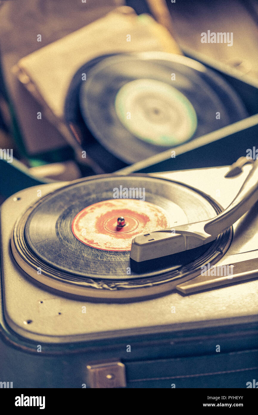 Old record player and old vinyls with scratched Stock Photo - Alamy