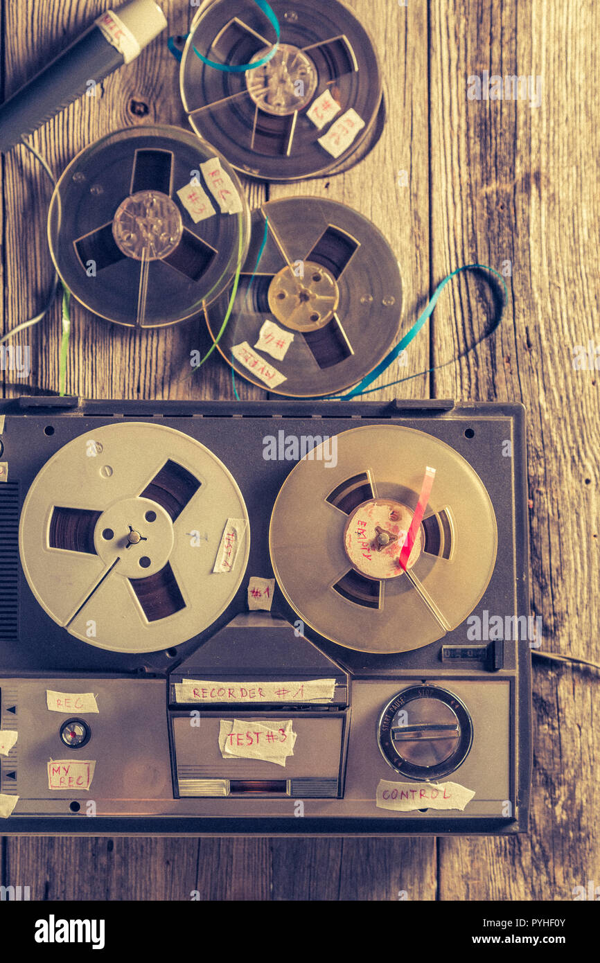 Classic reel-to-reel tape recorder with a few rolls of tape Stock Photo ...