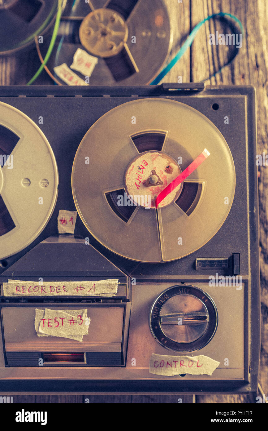Classic audio tape recorder with a few rolls of tape Stock Photo - Alamy