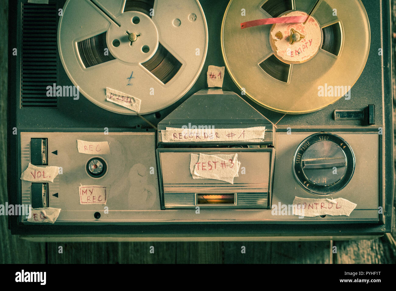 Retro reel-to-reel tape recorder with microphone and roll of tape Stock ...