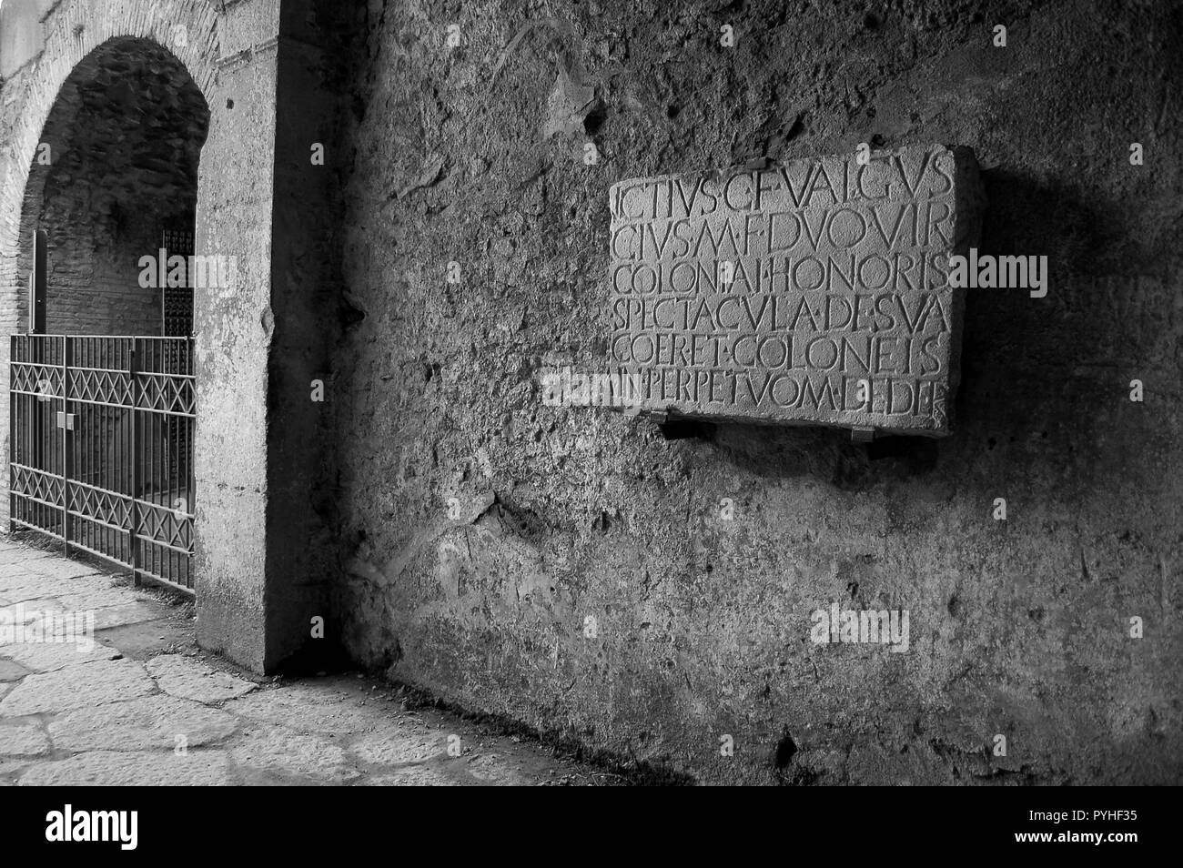 Pompeii Amphitheatre sign and entrance in Black and White Stock Photo ...
