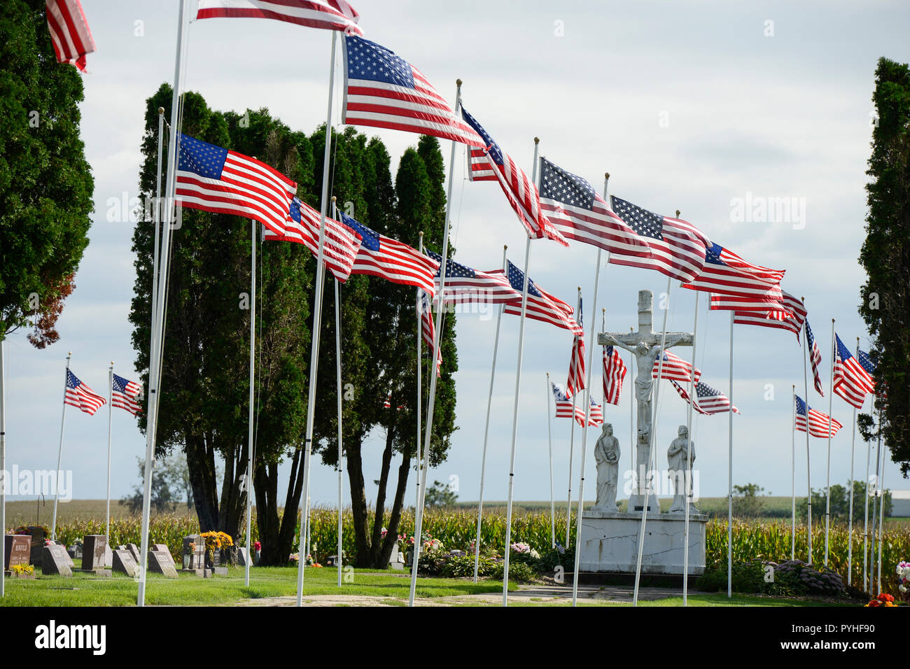 USA, Iowa, Epworth, national flag of the United States on catholic ...