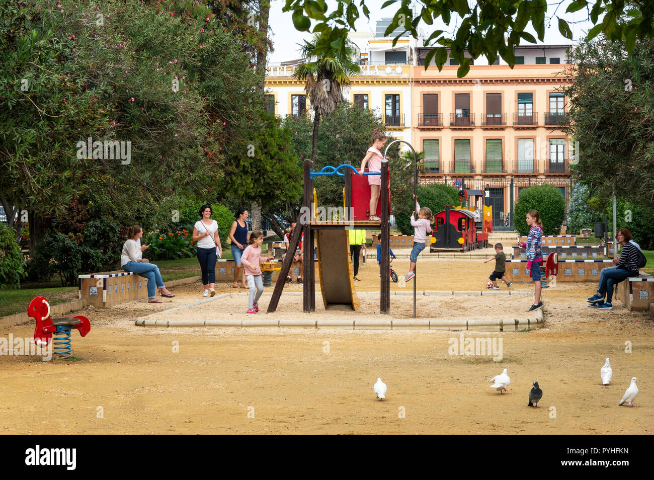 Playground in a park in Seville, Spain Stock Photo - Alamy