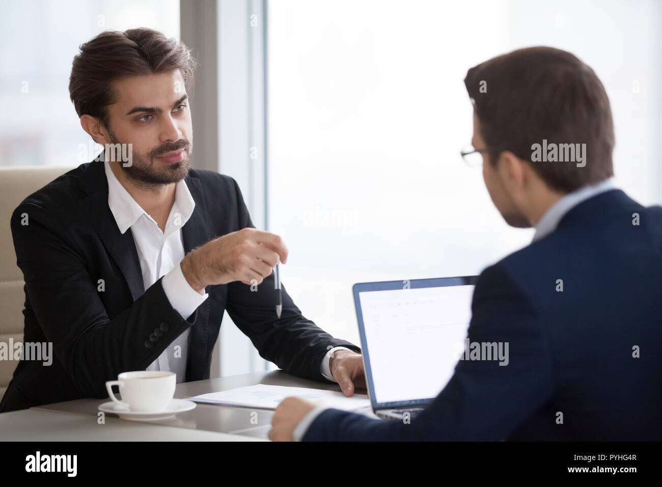 Two men in office suits hi-res stock photography and images - Alamy