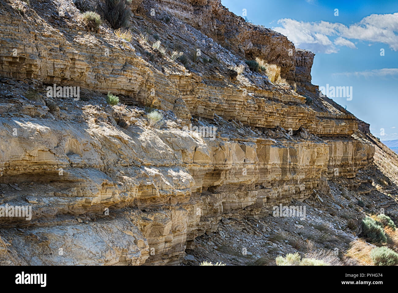 Palouse eastern Washington State rocky cliff with blue sky and clouds ...