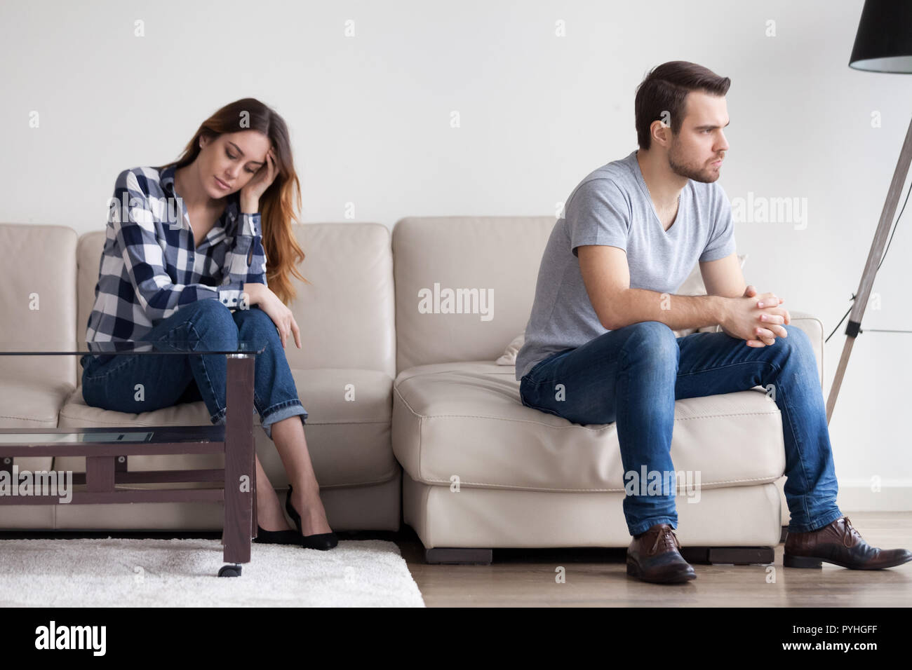 Sad, desperate, frustrated young couple no desire to talk Stock Photo ...