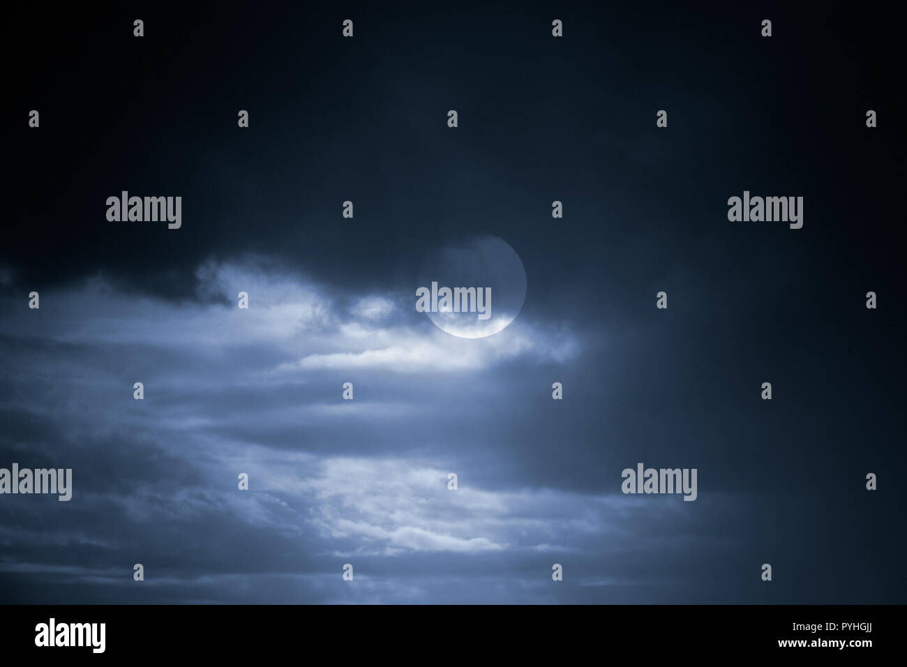 Dark overcast full moon night Stock Photo - Alamy