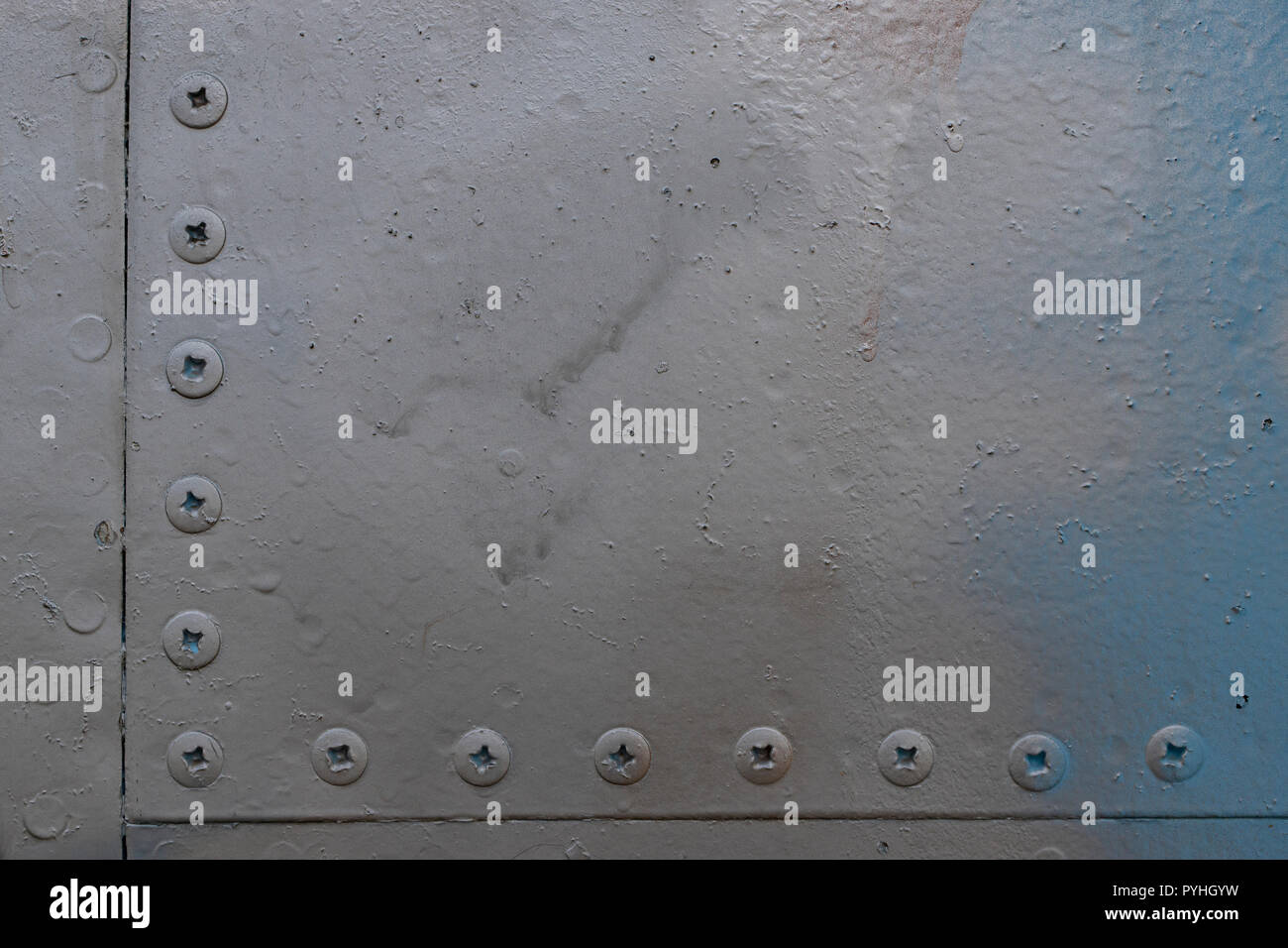 Old aluminum background detail of a military aircraft, surface ...
