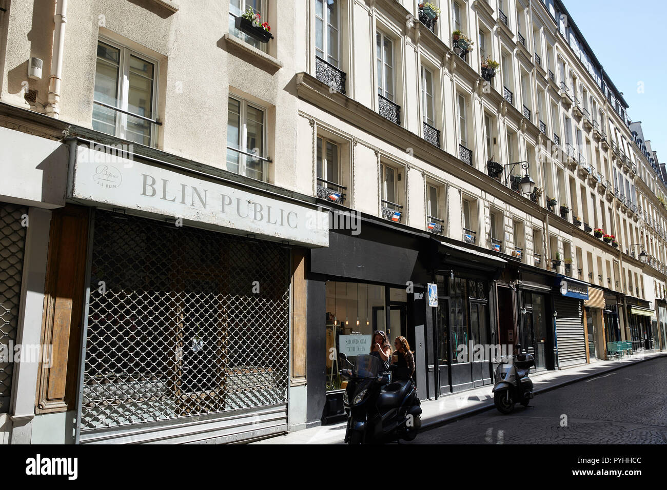 Paris, Ile-de-France, France - Small shops in historic residential ...