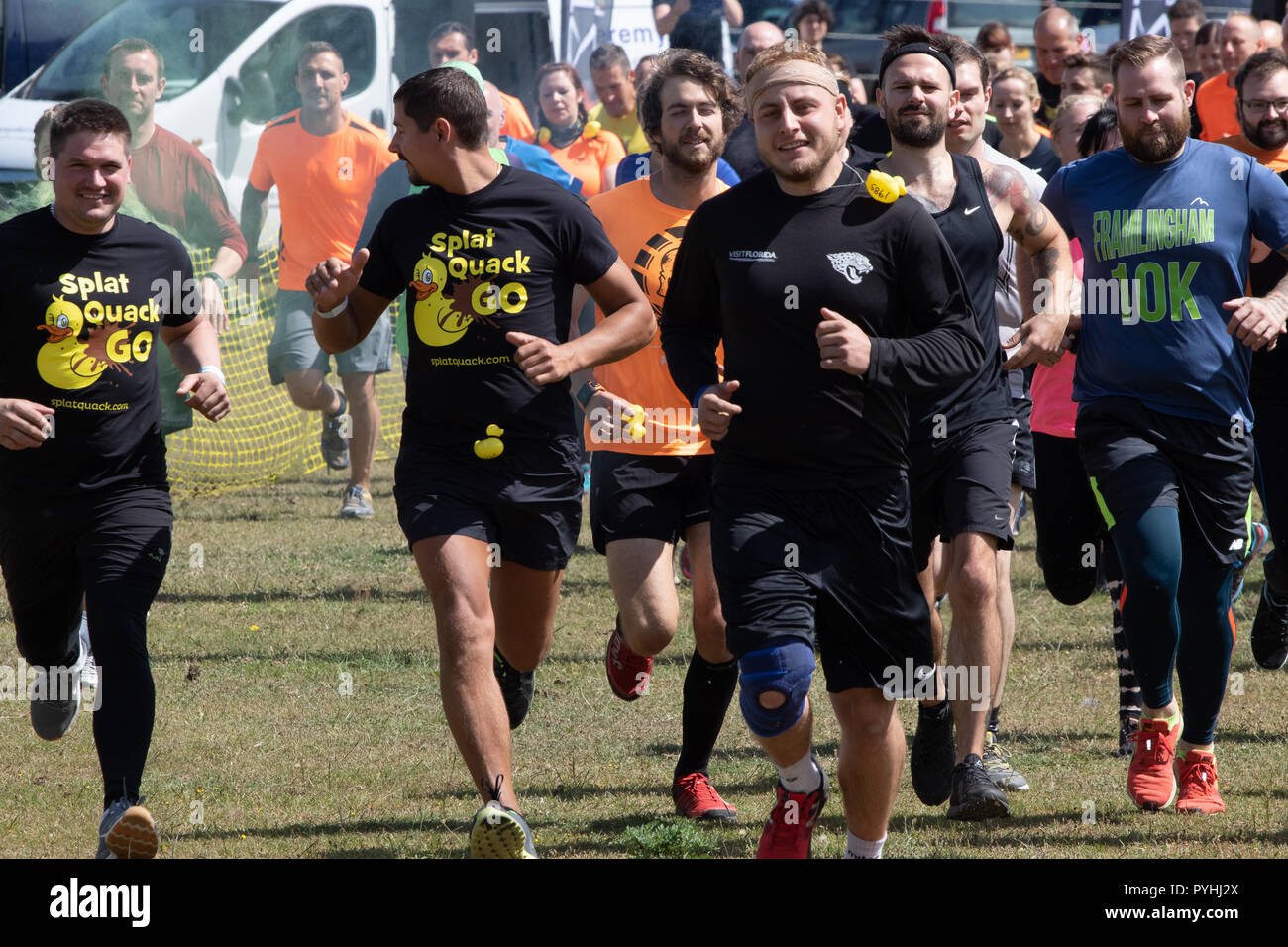 Mostly men running at the start of obstacle course run Splat Quack Go ...