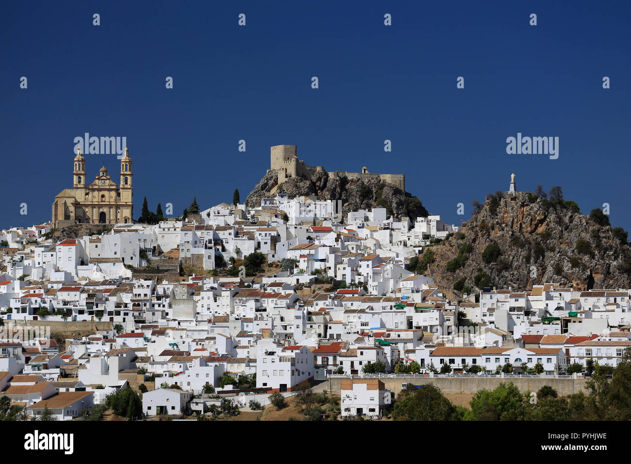 Distant view of Olvera in Andalucia Spain, showing the white houses on ...