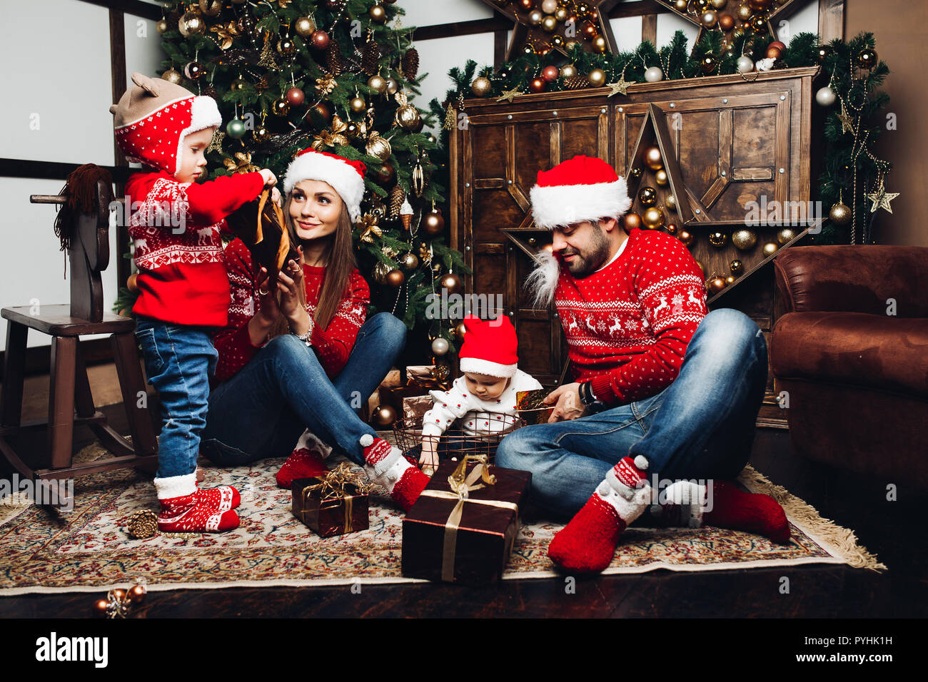 Child in red sweaters hi-res stock photography and images - Alamy