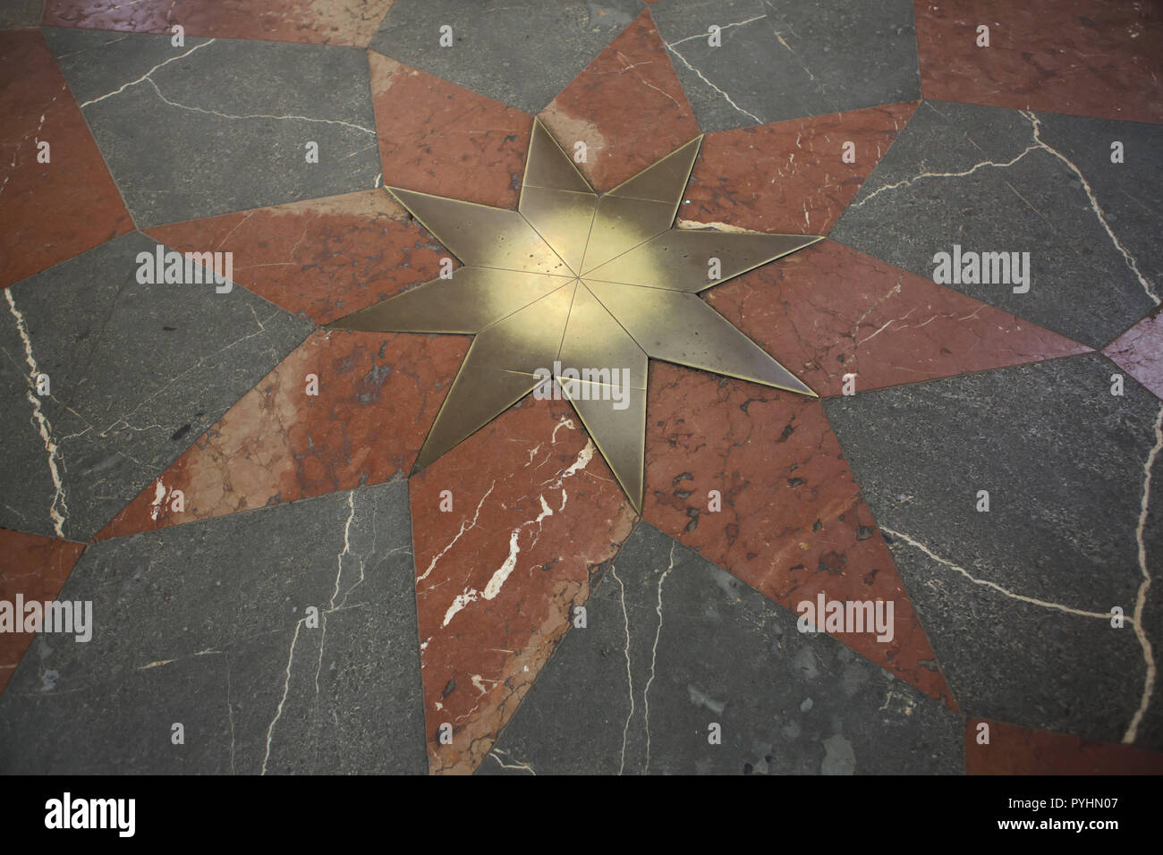 Marian star depicted on the floor under the main dome of the Assumption ...