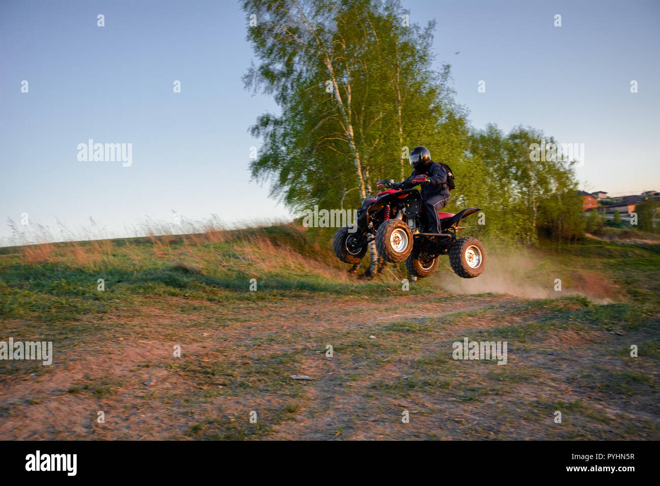 Moscow, Russia - May 17, 2014: ATV Rider in the action on Honda ...
