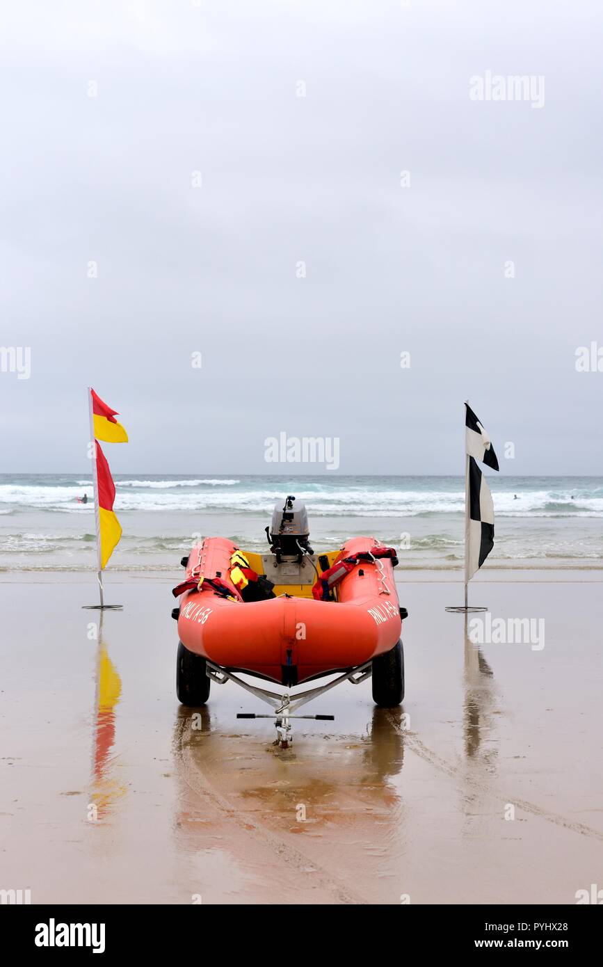RNLI beach safety flags and inflatable lifeboat,Perranporth Beach ...